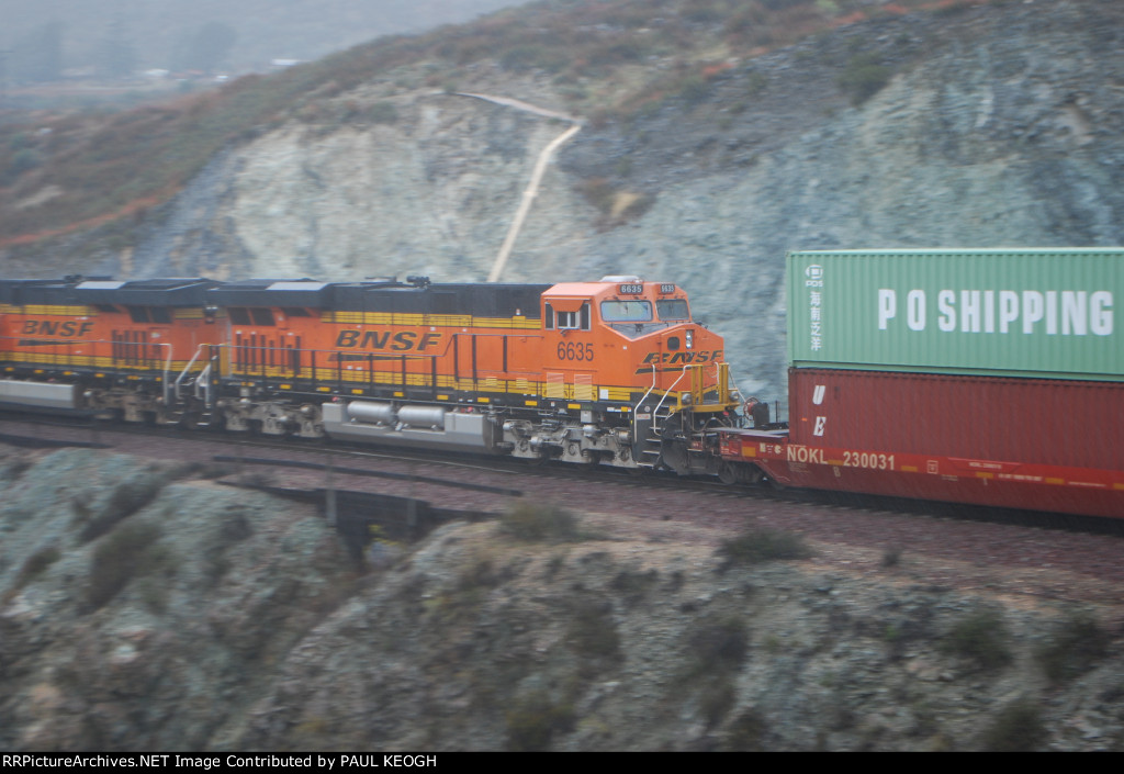BNSF 6635 in Dynamic Braking as she heads west towards Los Angeles, Ca as a # 2 unit on this ...